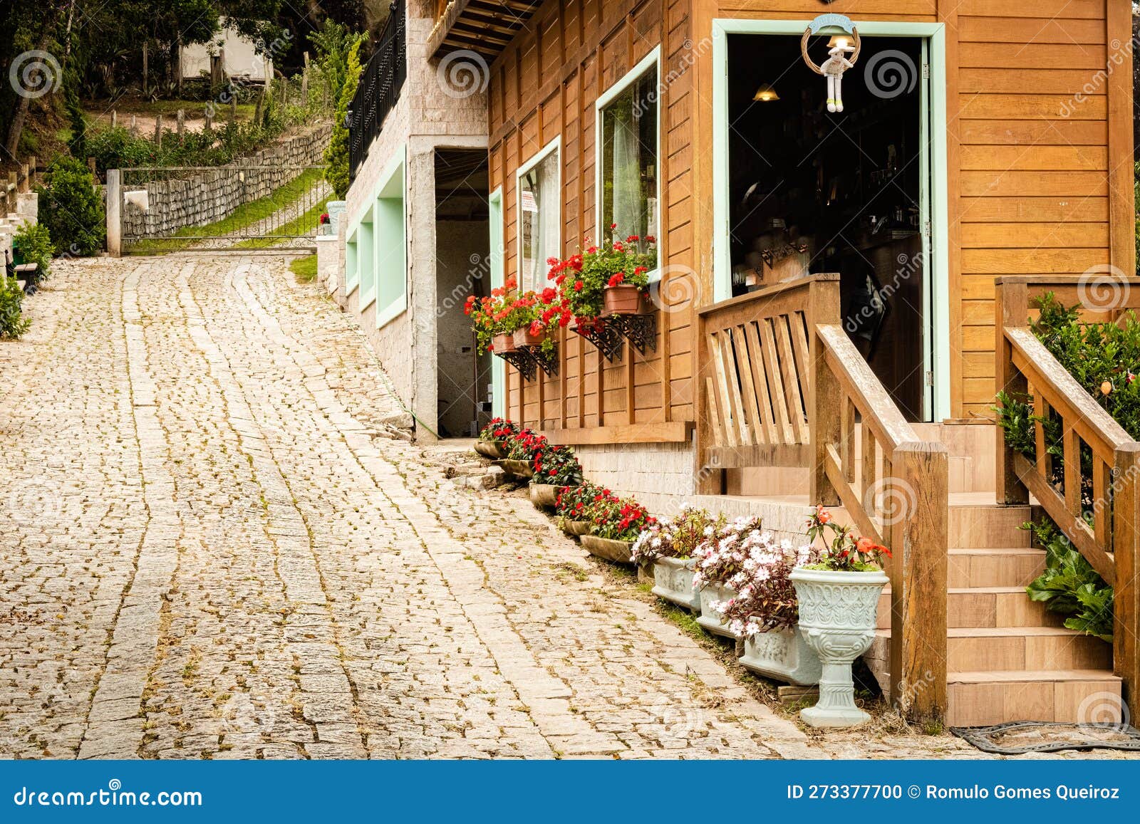 Rustic Wooden House Next To a Stone Tiled Ramp Stock Photo - Image of ...
