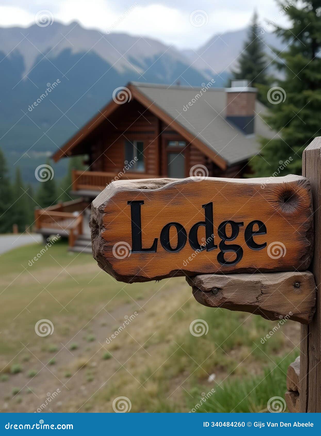 Rustic Wooden Lodge Sign with Mountain Cabin Backdrop Stock ...