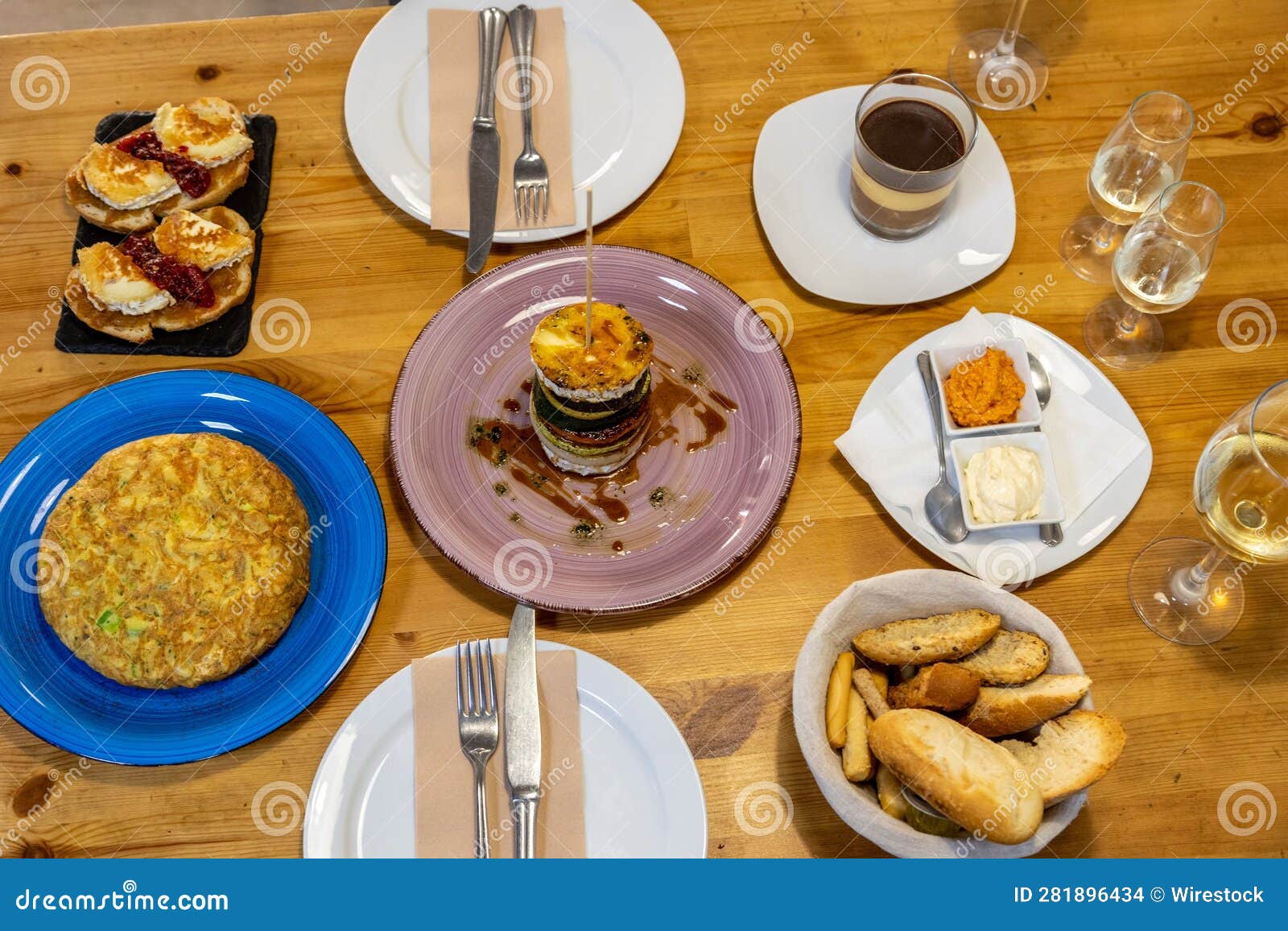 Rustic Wooden Table Displaying a Selection of Delicious Dinner Food on ...