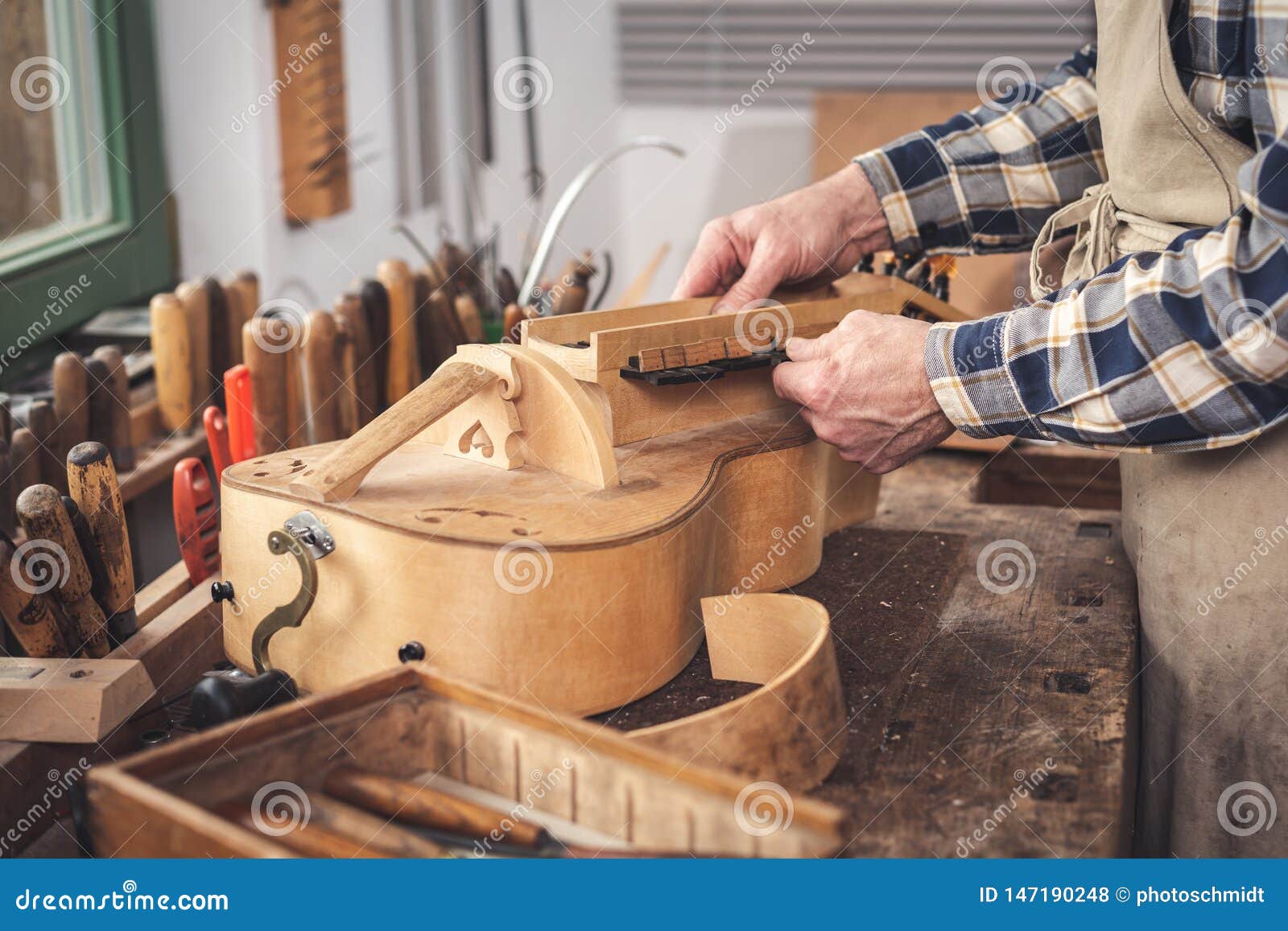Instrument Maker Working on a Hurdy Gurdy Stock Photo - Image of ...