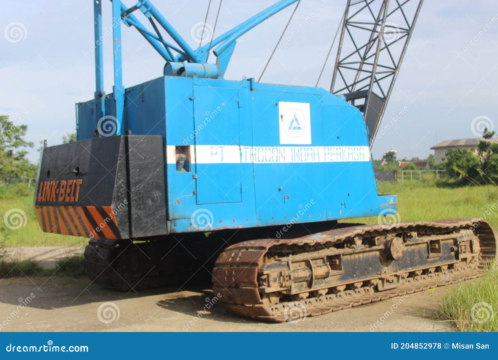 Rusting Antique Blue Crane with Blue Sky Editorial Stock Photo - Image ...