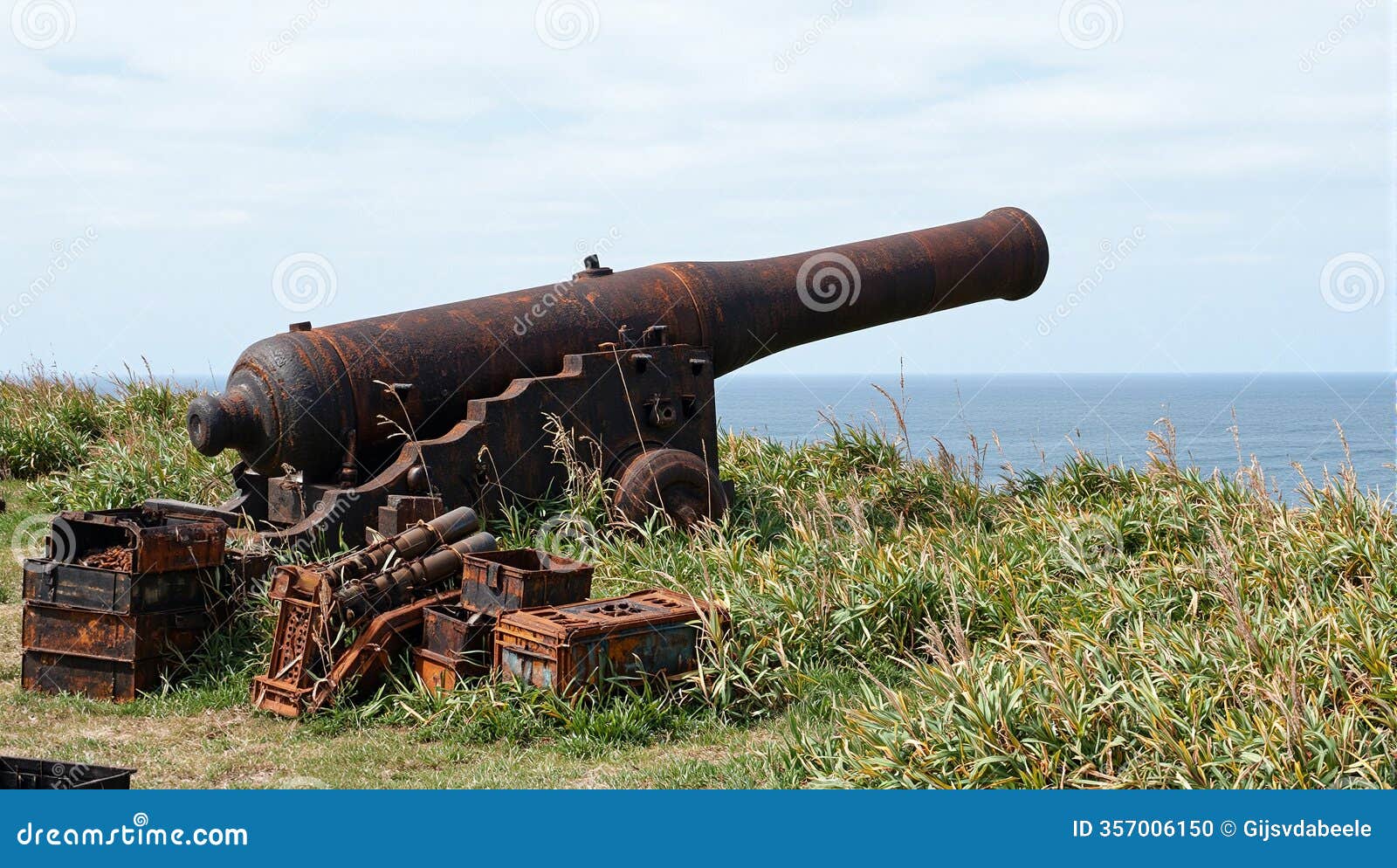 Rusting Battleship Cannon on Cliff Edge Amidst Overgrown Grass and ...
