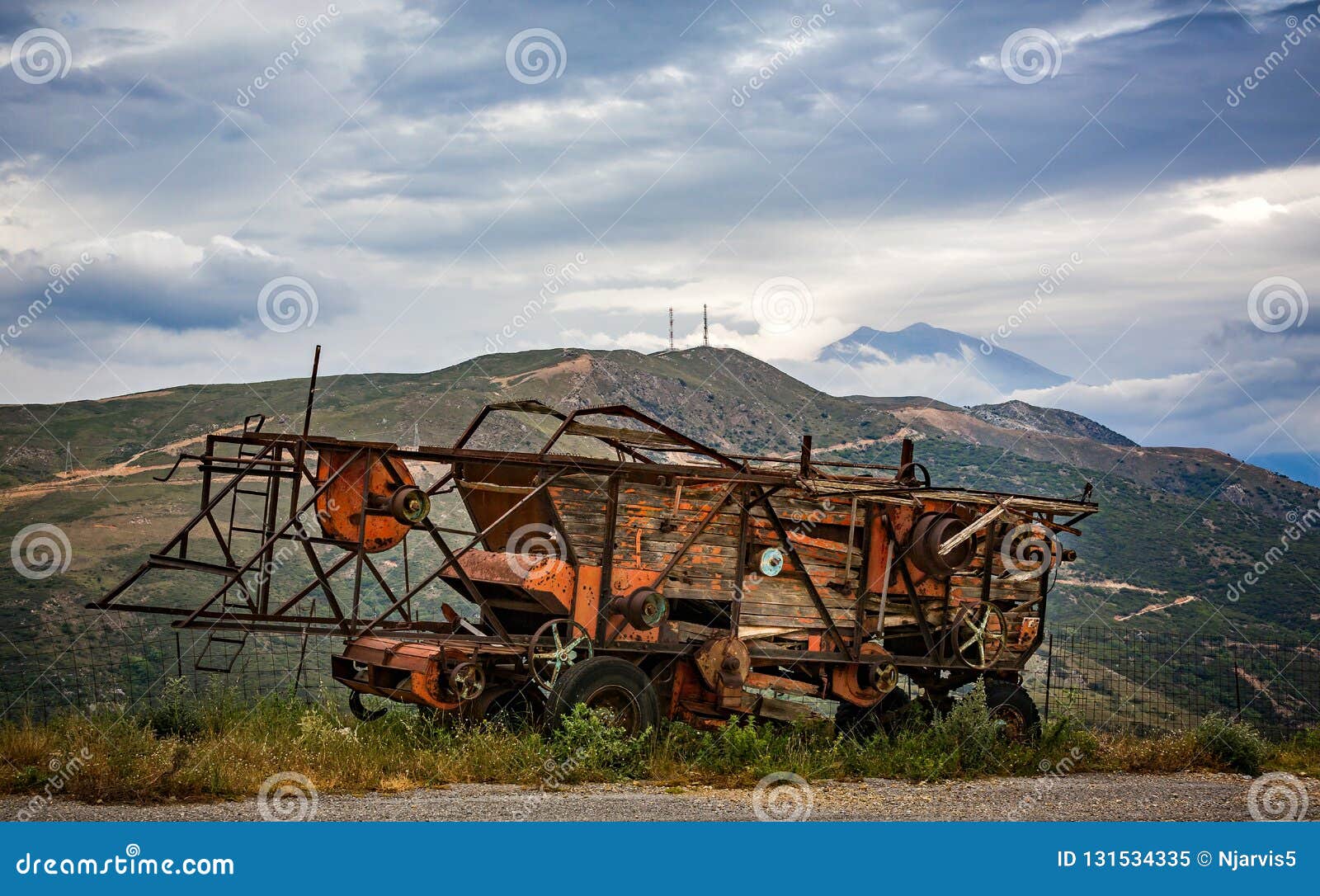 Rusting and Decaying Combine Harvester Abandoned on Mountain Roadside ...