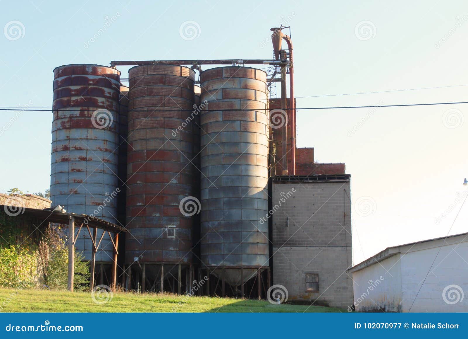 Rusting Silos at an Old Milling Facility Stock Image - Image of rusty ...