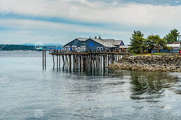 Ruston Shoreline Building stock photo. Image of pilings - 322524788