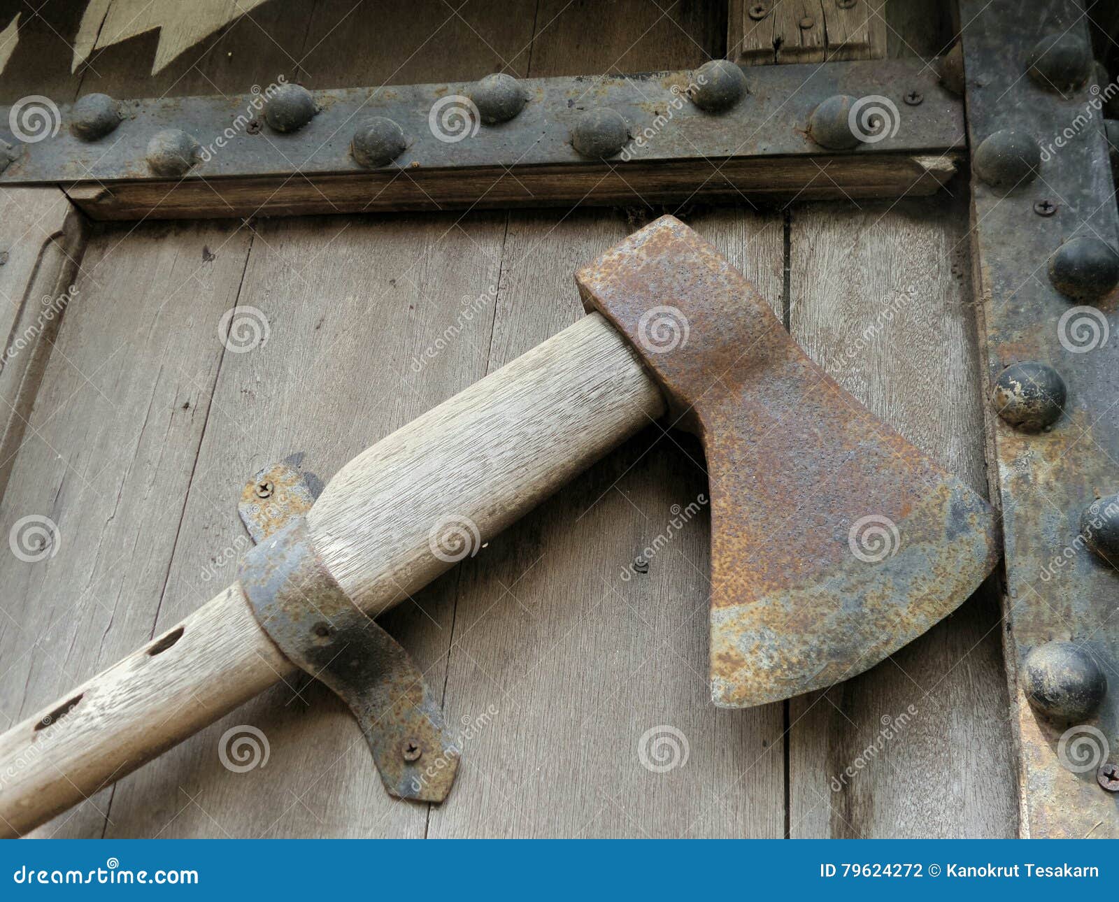 Rusty Axe on Old Wooden Door Stock Photo - Image of wooden, front: 79624272