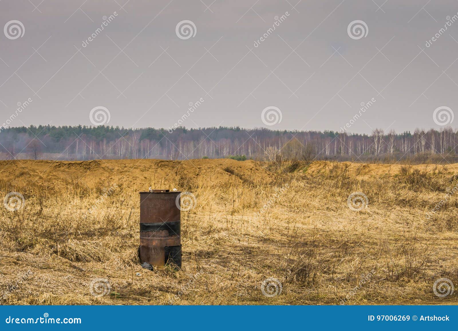 Rusty Barrel on Field stock image. Image of garbage, biohazard - 97006269