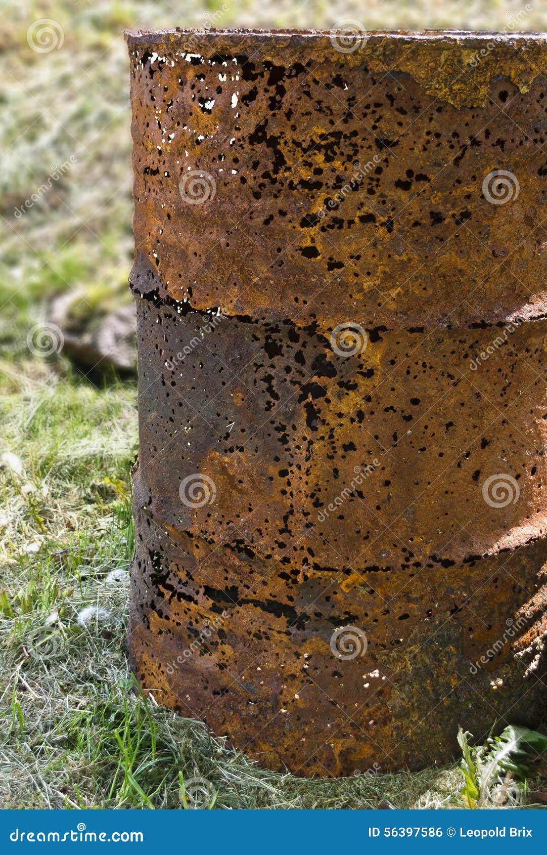 Rusty barrel with holes stock photo. Image of disposal - 56397586