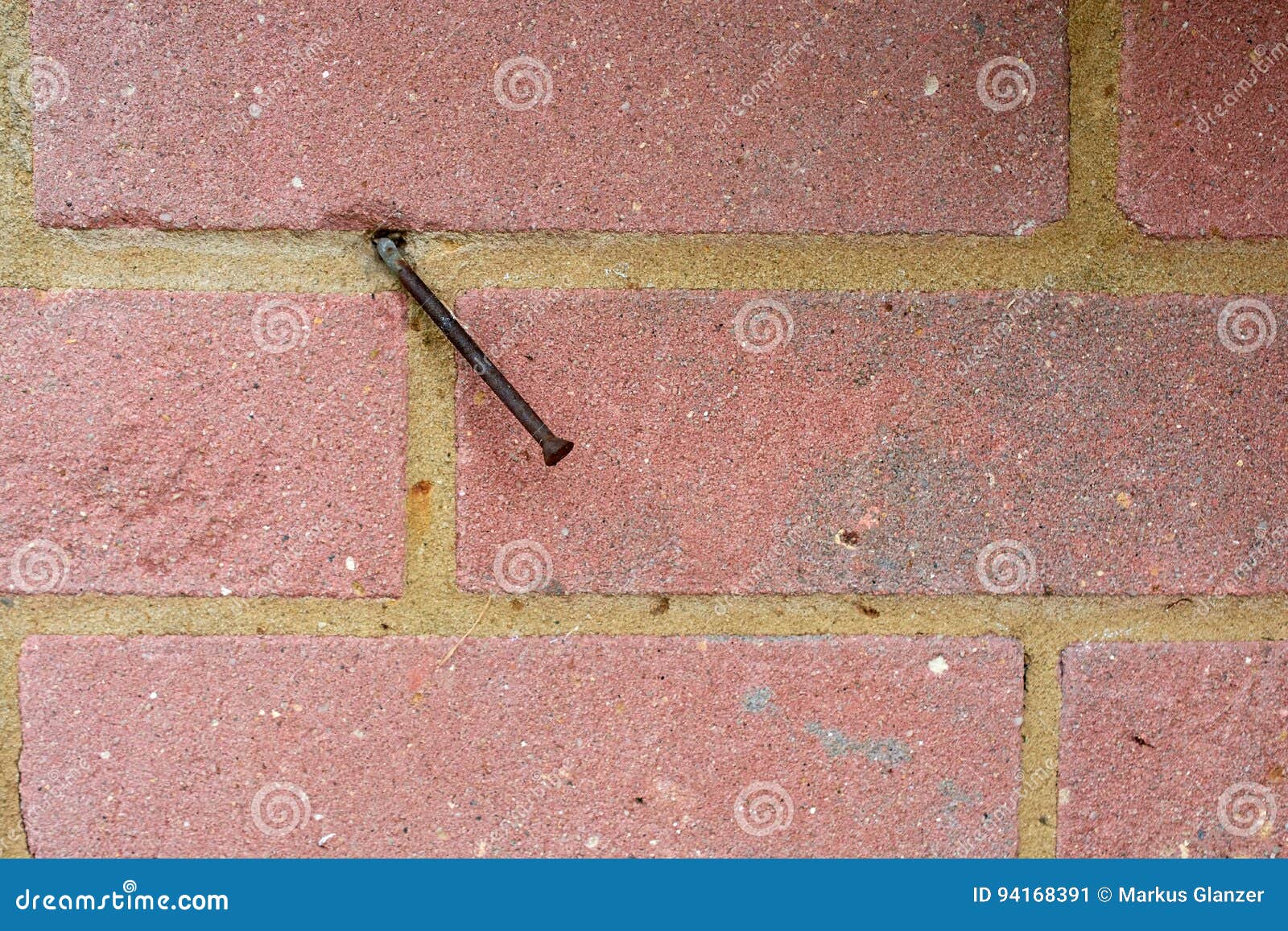 Rusty Bent Nail in Red Brick Wall Stock Image - Image of dirty, texture ...
