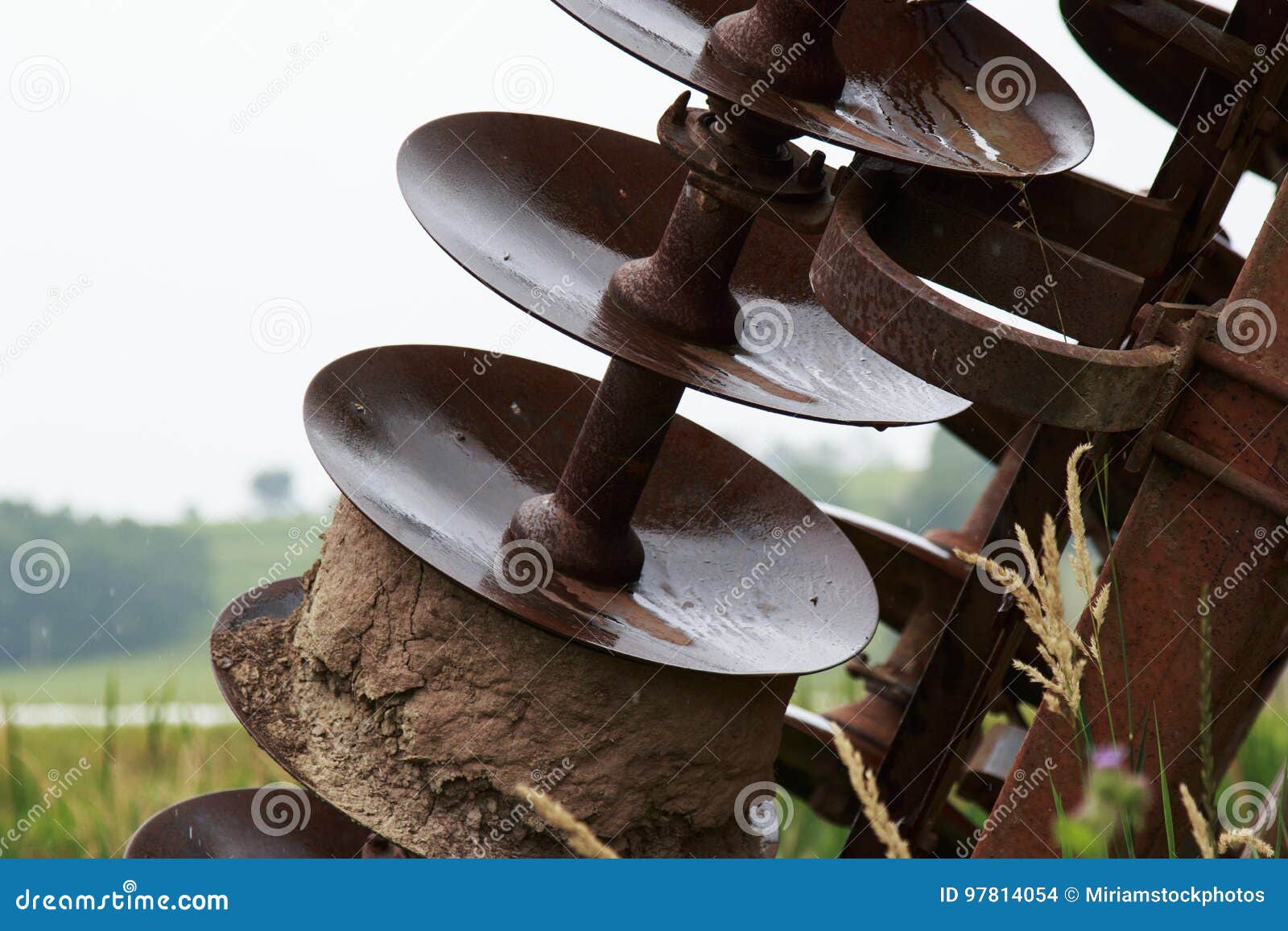 Rusty Blades of Farm Equipment in a Field Stock Photo - Image of ...