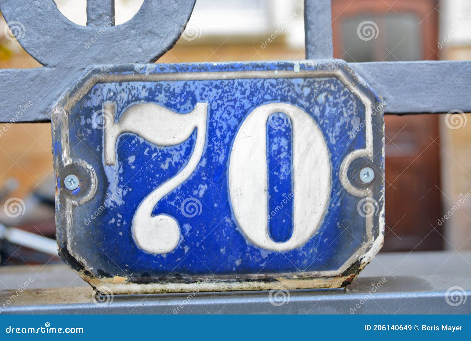 A Blue House Number Plaque, Showing the Number Seventy 70 Stock Image ...