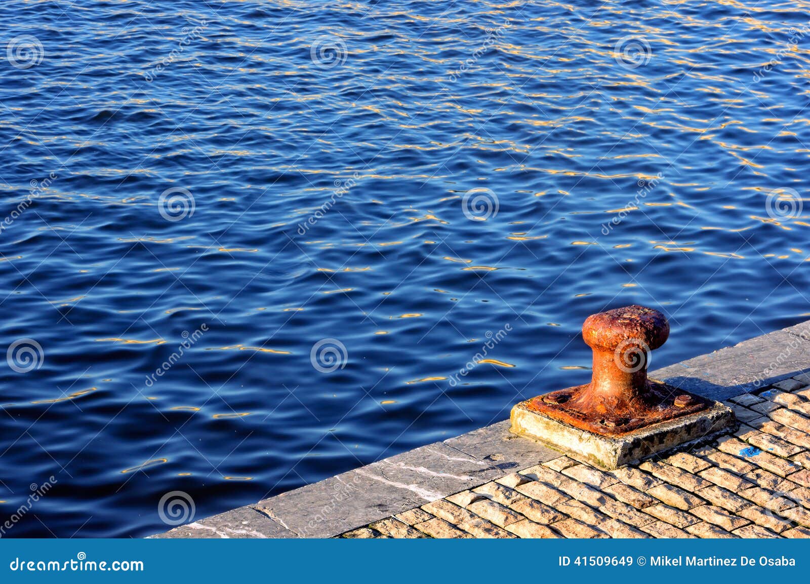 Rusty Old Bollard On The Dock Of Some Harbour In Pico-Azores. Stock ...