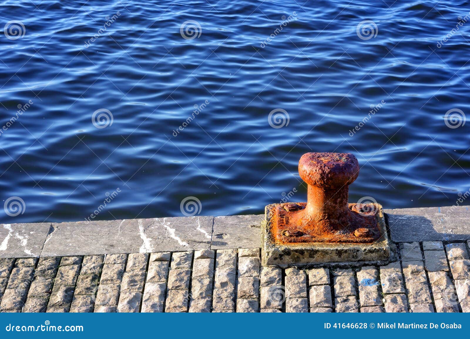 Rusty Old Bollard On The Dock Of Some Harbour In Pico-Azores. Stock ...