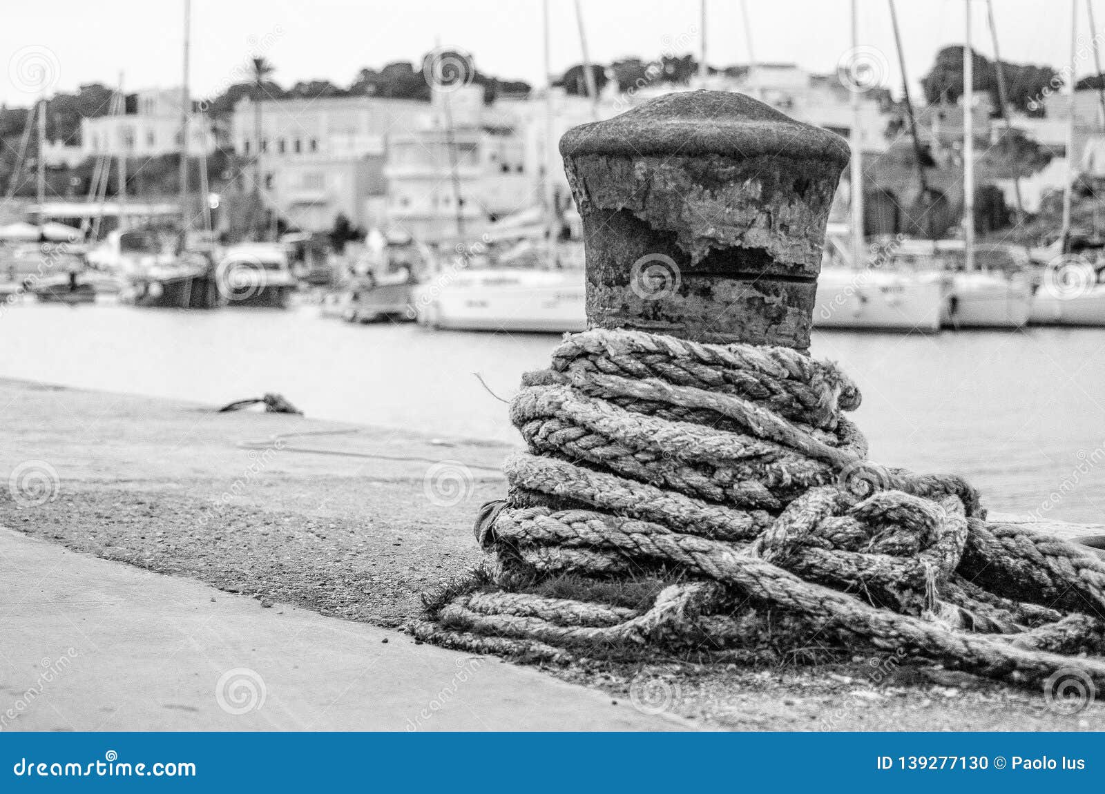 Rusty Bollard with Rope in Bw Stock Photo - Image of harbor, material ...