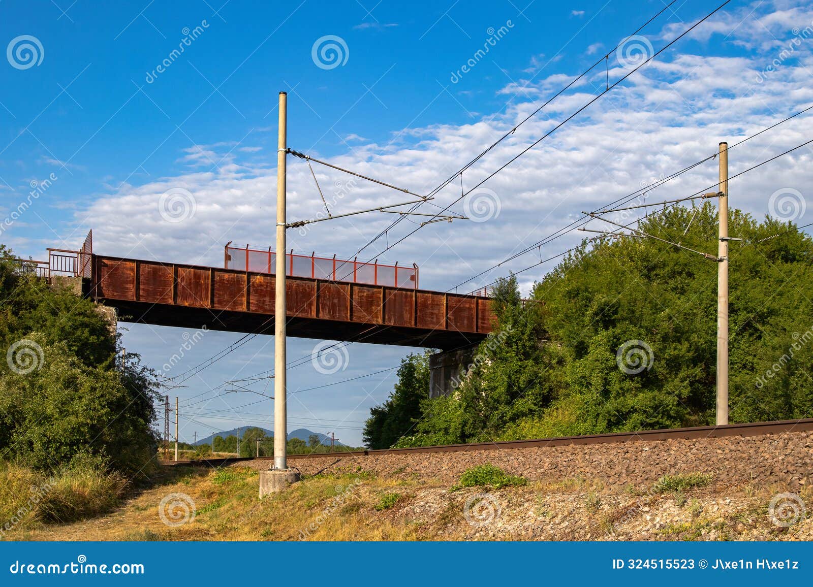 Rusty Bridge Leading Over the Railway Line. Stock Image - Image of ...