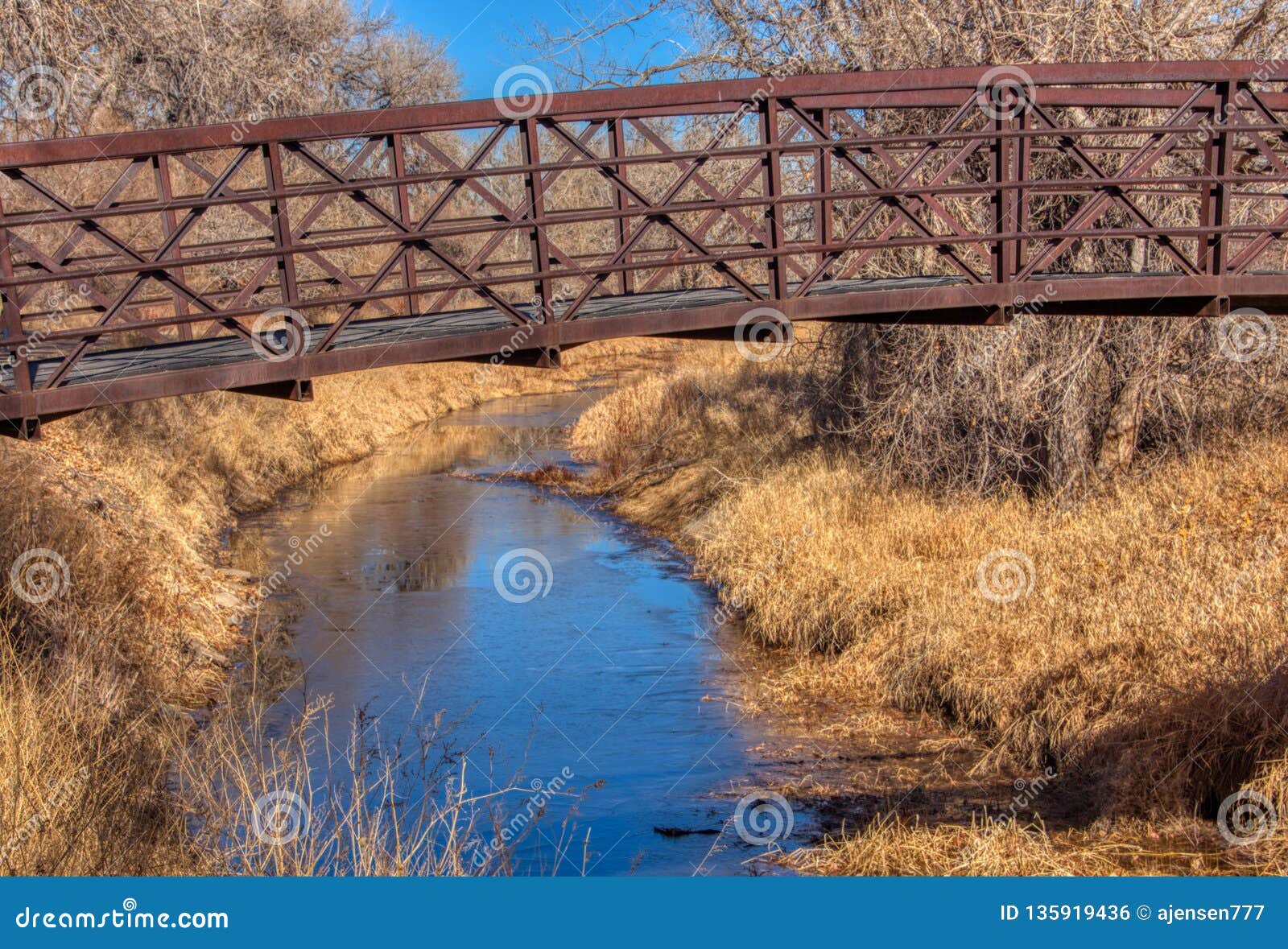 Rusty bridge over stream editorial photo. Image of bridge - 135919436