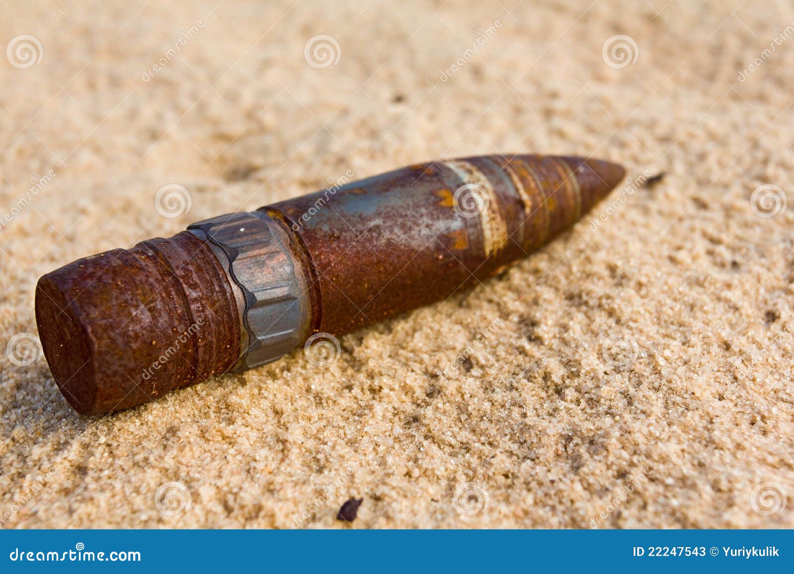 Rusty Bullet On A Sand Stock Photos - Image: 22247543