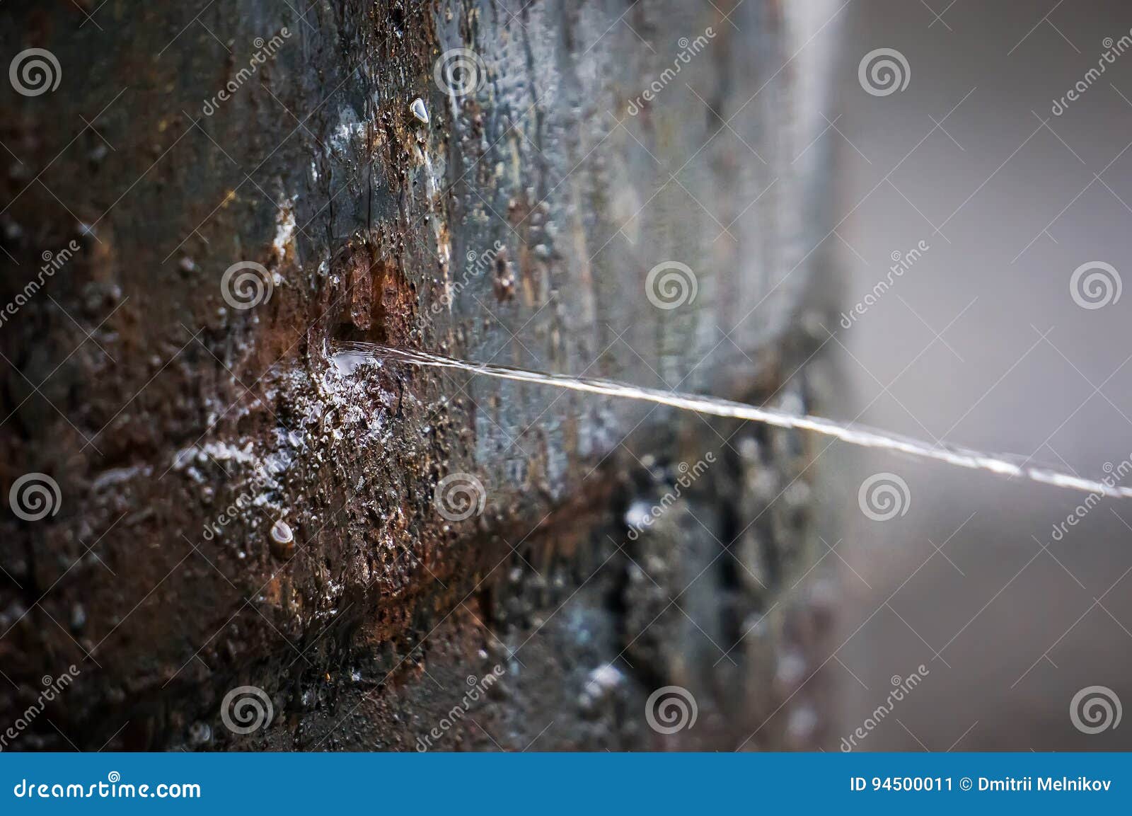 Rusty Burst Pipe Spraying Water after Freezing in Winter. Stock Image ...