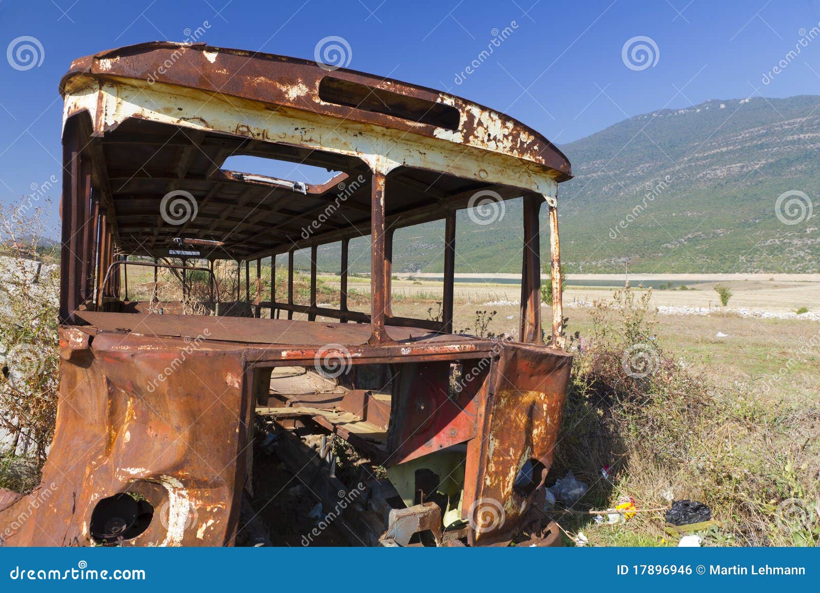 Rusty Bus Wreck in Arid Landscape Stock Photo - Image of corrosion ...