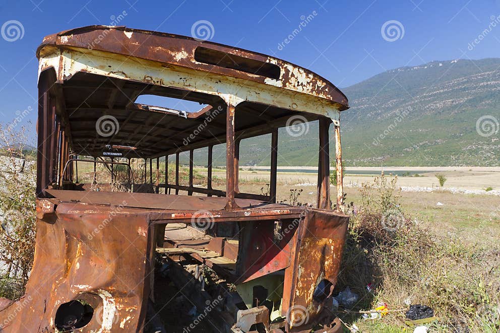 Rusty Bus Wreck in Arid Landscape Stock Photo - Image of corrosion ...