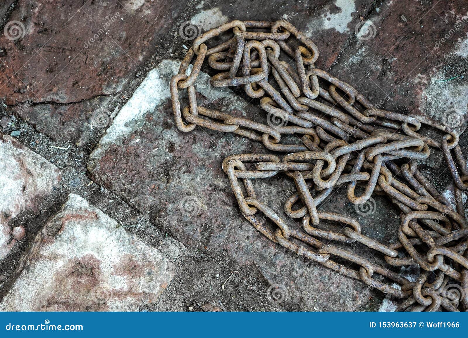 Rusty Chain on the Brickwork. the Symbol of Slave Labor Stock Image ...