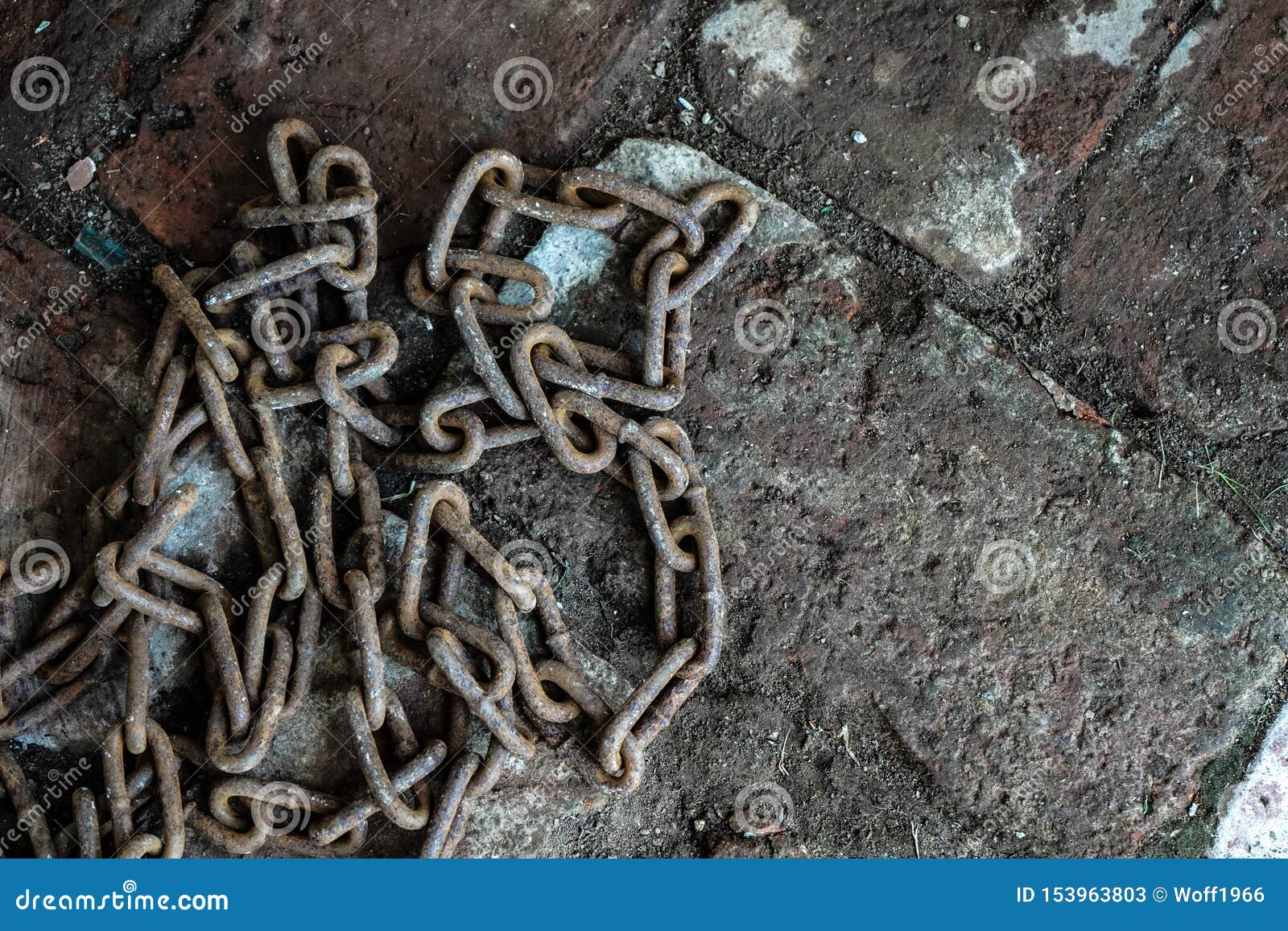 Rusty Chain on the Brickwork. the Symbol of Slave Labor Stock Image ...