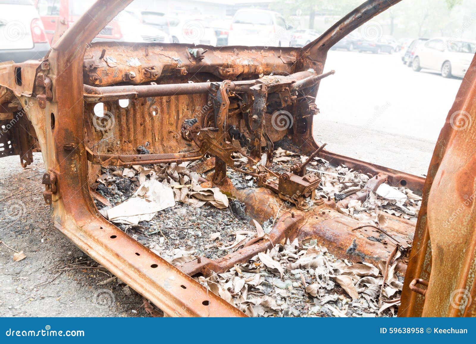 Rusty Chassis of a Burnt Car Abandoned by the Side of the Street Stock ...