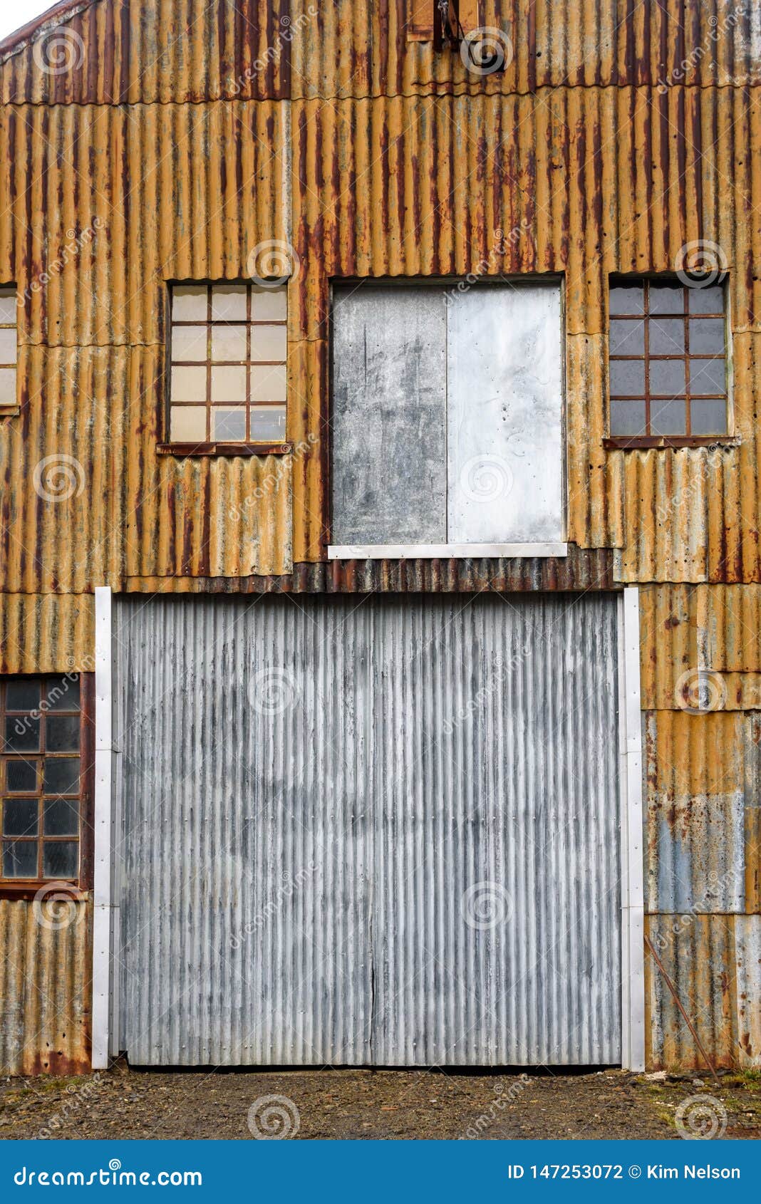 Rusty Corrugated Metal Wall, with Windows and Doors Stock Photo - Image ...