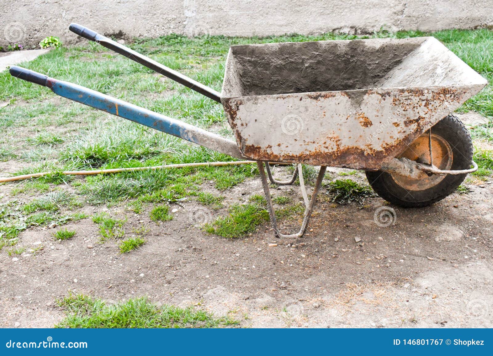 Dirty Wheelbarrow Near Pile Of Sand Royalty-Free Stock Photo ...