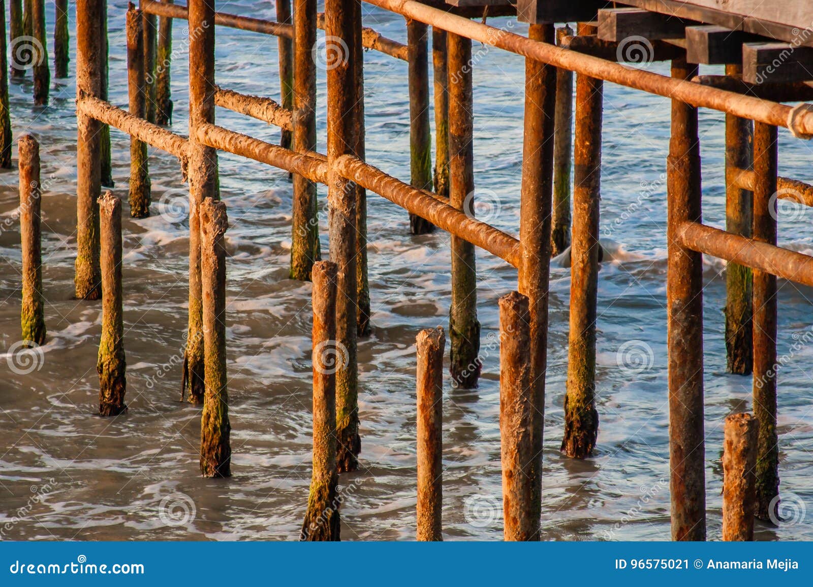 Rusty dock pilllars stock image. Image of rickety, colombia - 96575021