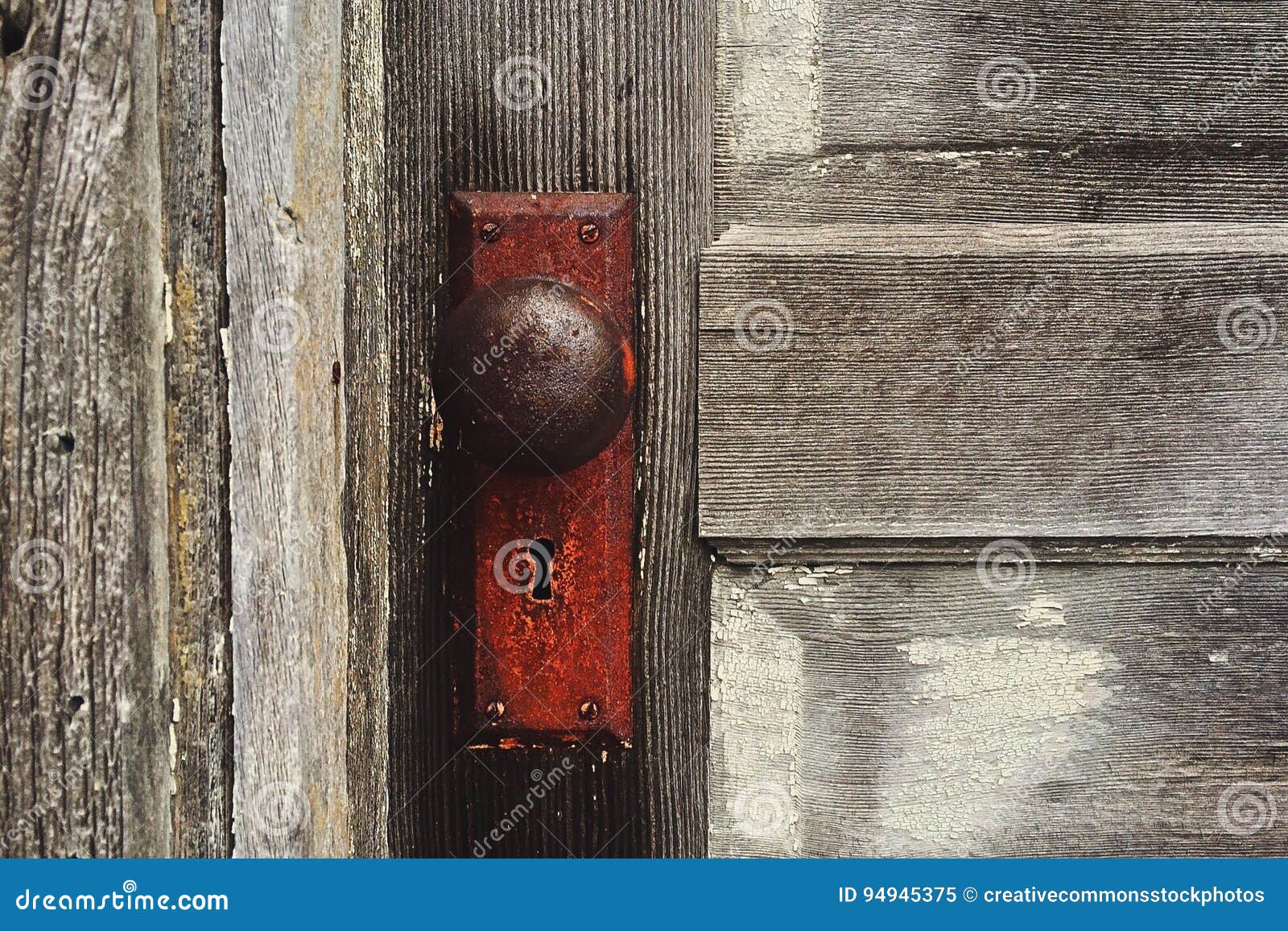 Rusty Door Knob On Wooden Door Picture. Image: 94945375