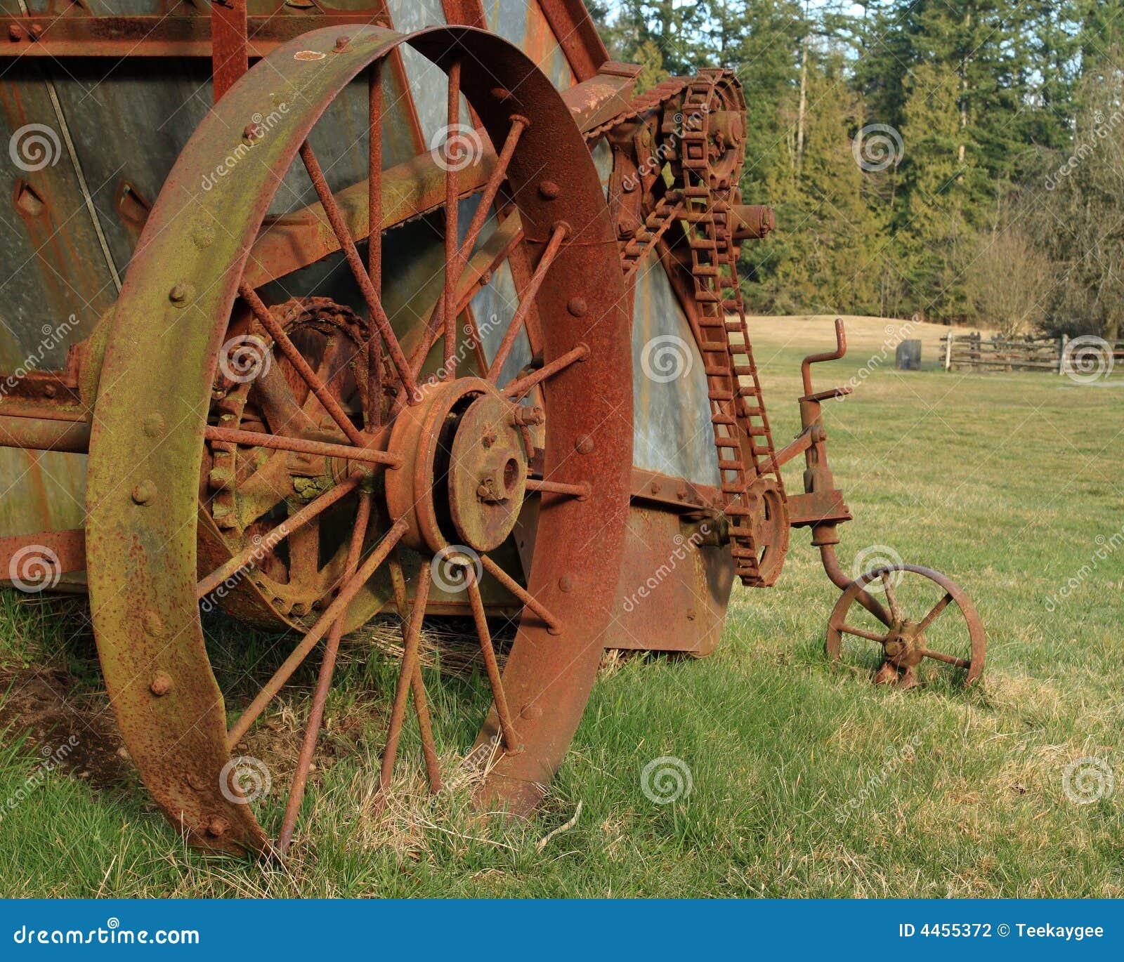 Rusty farm machinery stock photo. Image of wheels, wall - 4455372