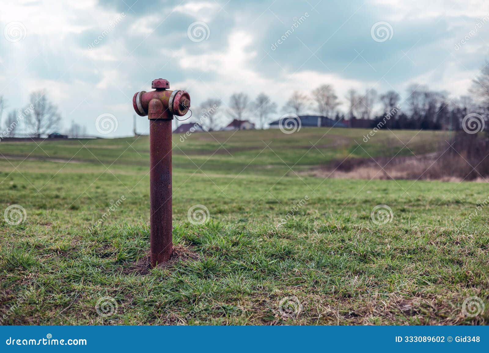 Rusty Fire Hydrant In The Parking Lot Of A Building Stock Image ...