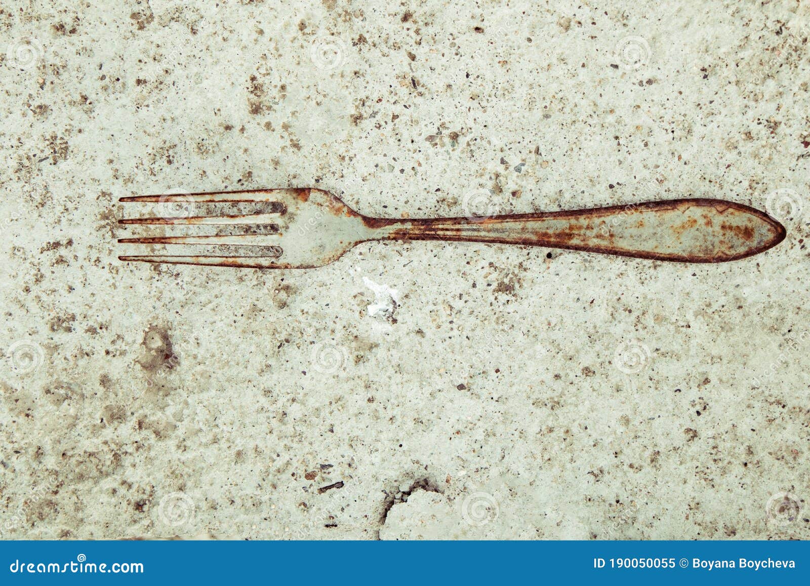 A Rusty Fork Against a Concrete Wall Stock Image - Image of cement ...