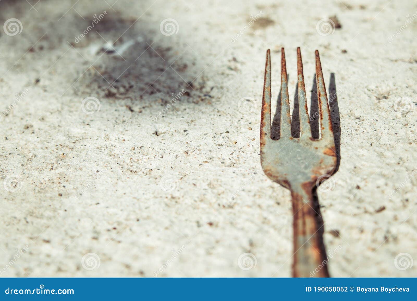 A Rusty Fork Against a Concrete Wall Stock Photo - Image of clean, rust ...