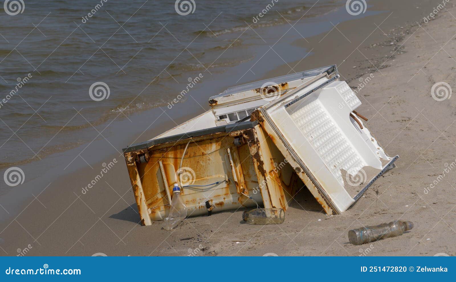 Rusty Fridge on a Beach. Environment Pollution Concept Stock Photo ...