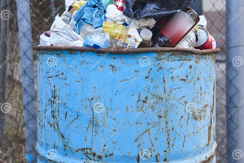 Rusty Garbage Can Full of Waste. Trash Management. Environment ...