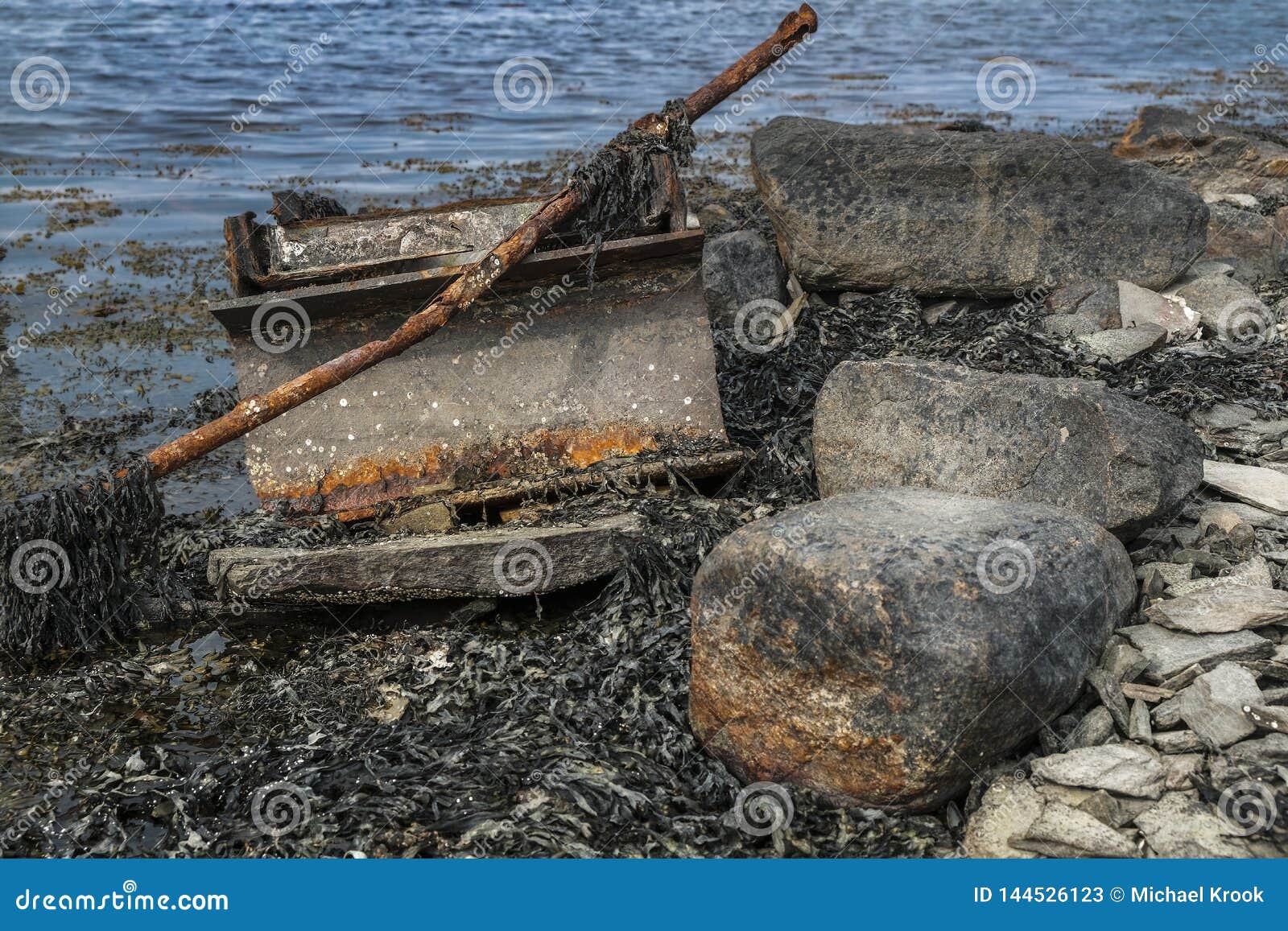 Rusty garbage by the ocean stock image. Image of equipment - 144526123