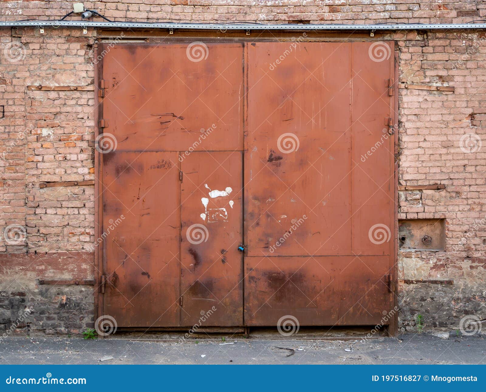 Rusty Gate in an Old Brick Warehouse. Old Building Stock Image - Image ...