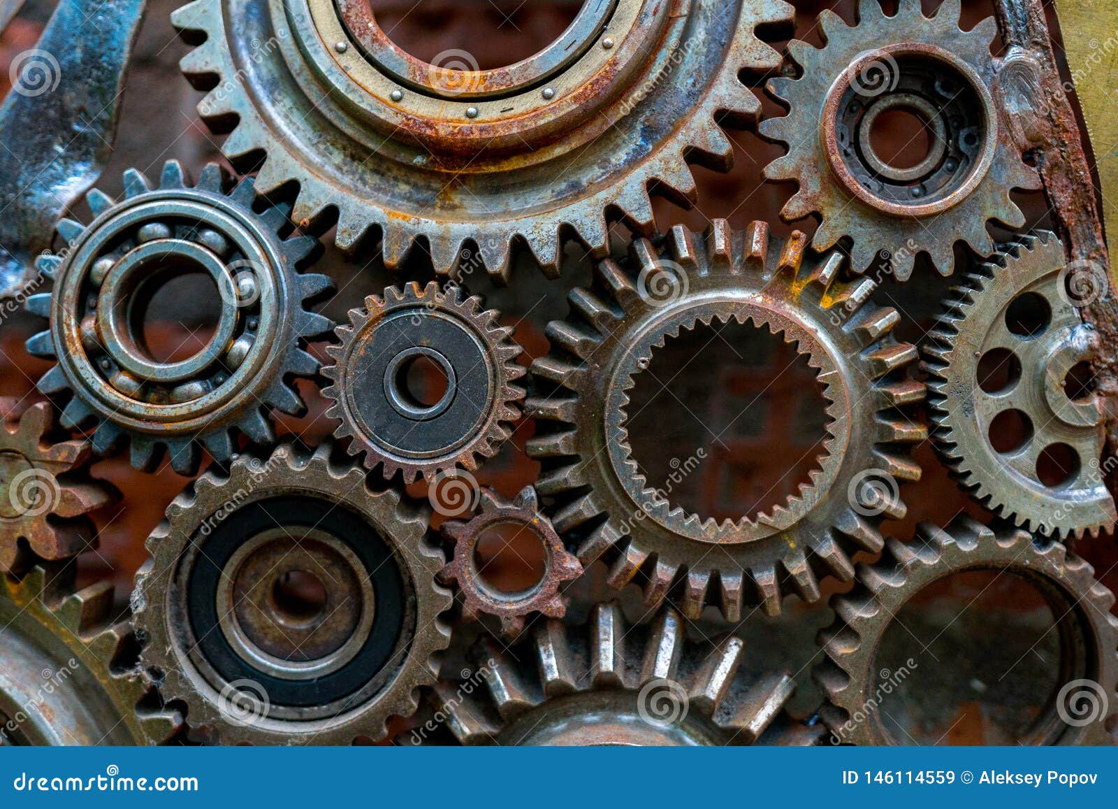 Large and Small Rusty Gears Form a Pattern. Stock Image - Image of ...