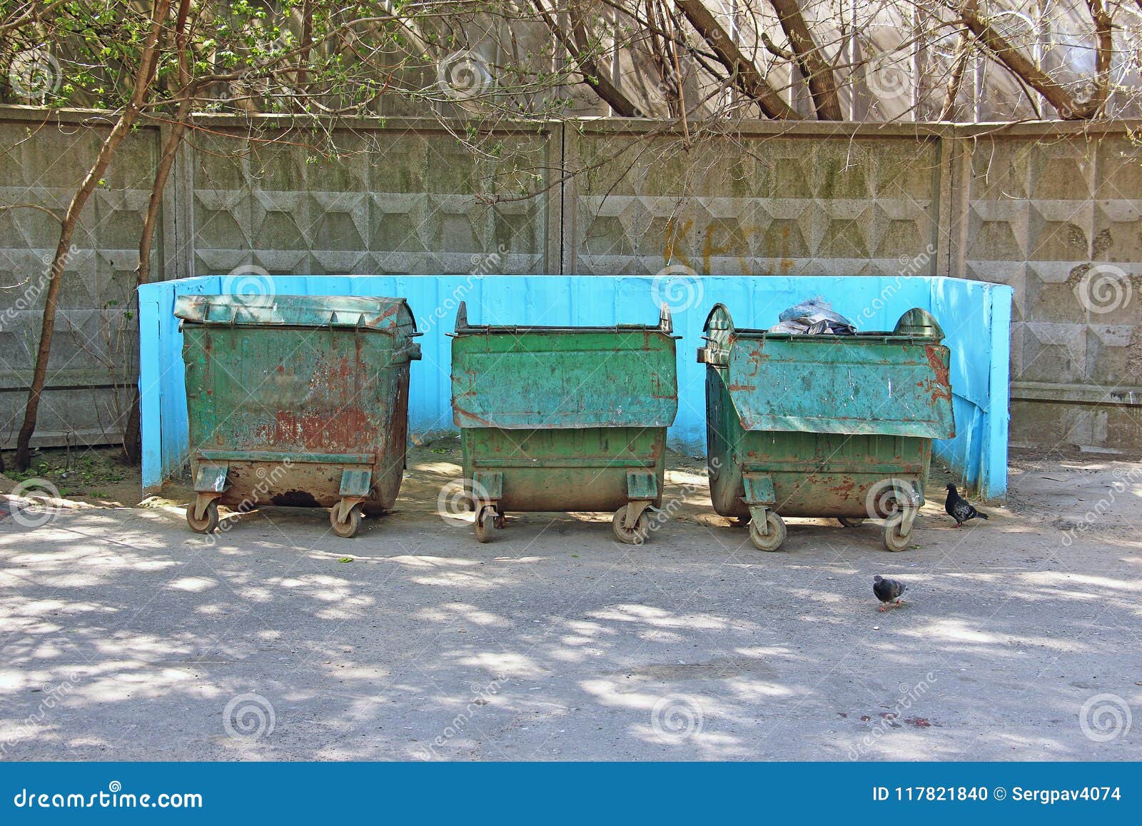 Rusty Green Garbage Cans in the Trash Stock Photo - Image of debris ...