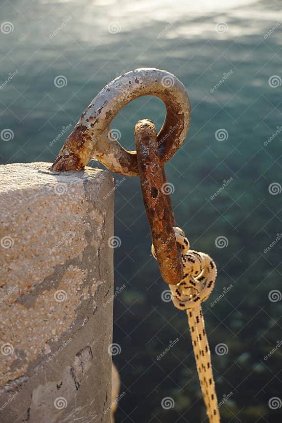 Rusty Hook with String for Tying Boats and Small Ships Stock Image ...