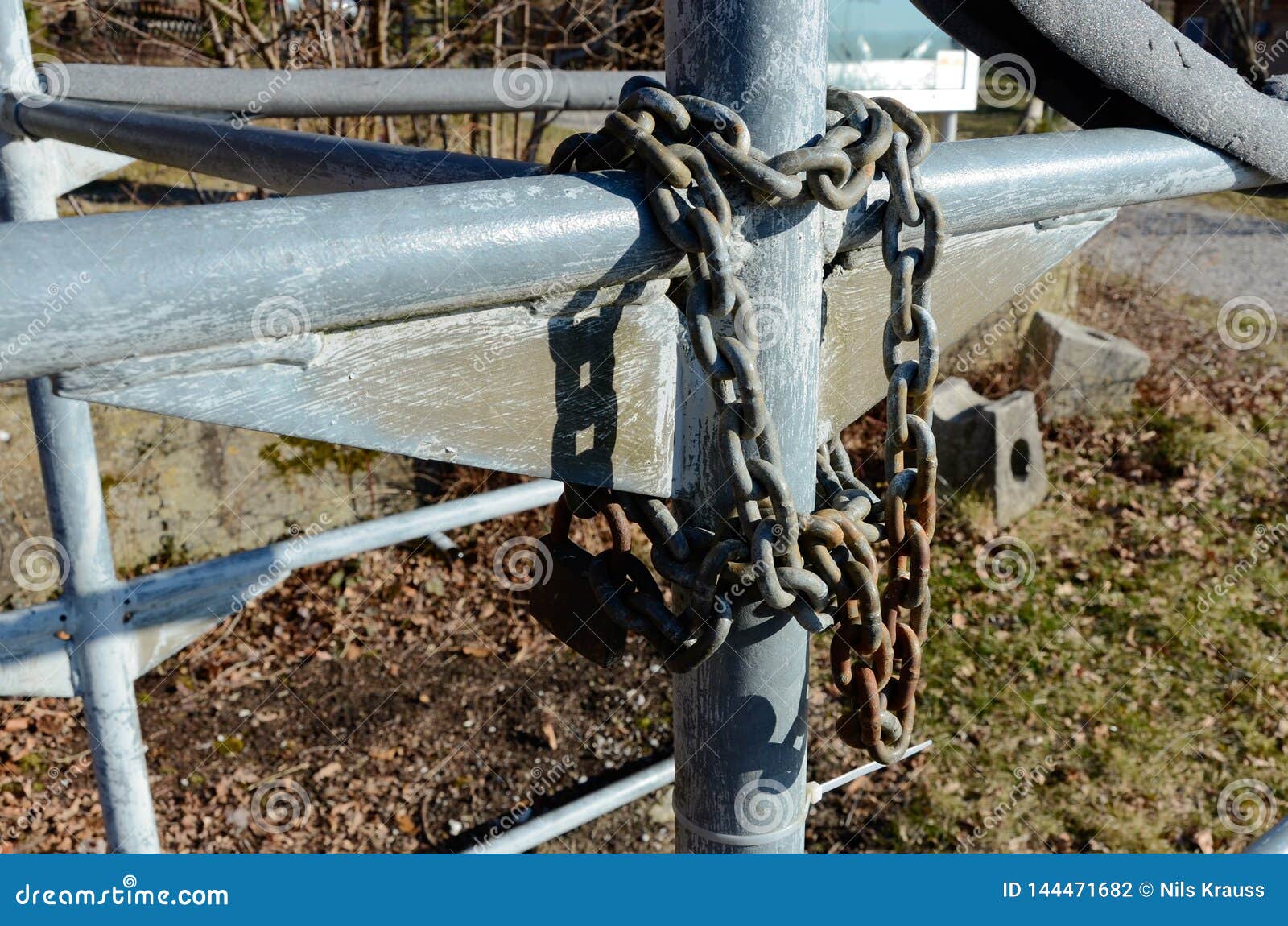 Rusty Iron Chain Locked Around Metal Framework Stock Photo - Image of ...