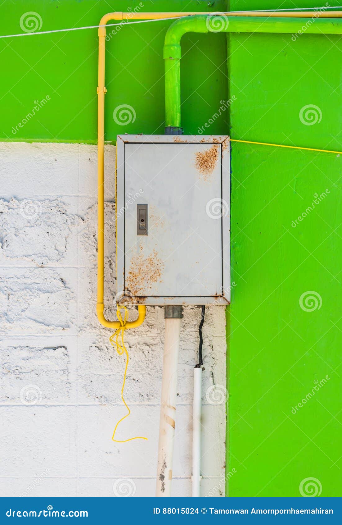 Rusty Iron Control Box on White and Green Concrete Wall Stock Photo ...