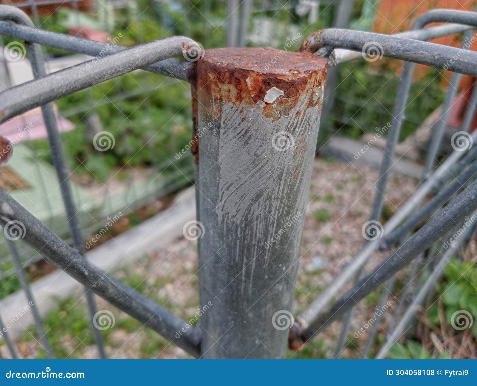 Rusty iron fence posts stock photo. Image of fence, posts - 304058108