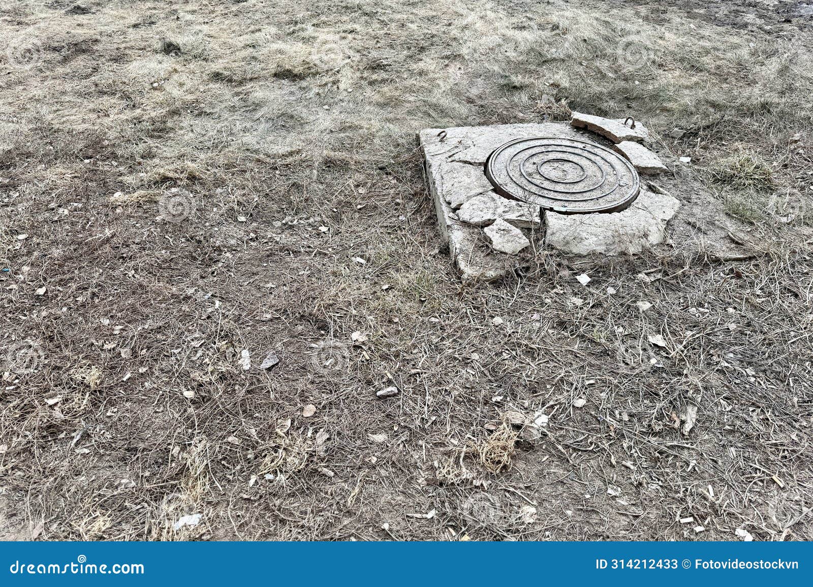 A Rusty Iron Hatch with a Pattern and a Large Gap at the Top is Mounted ...