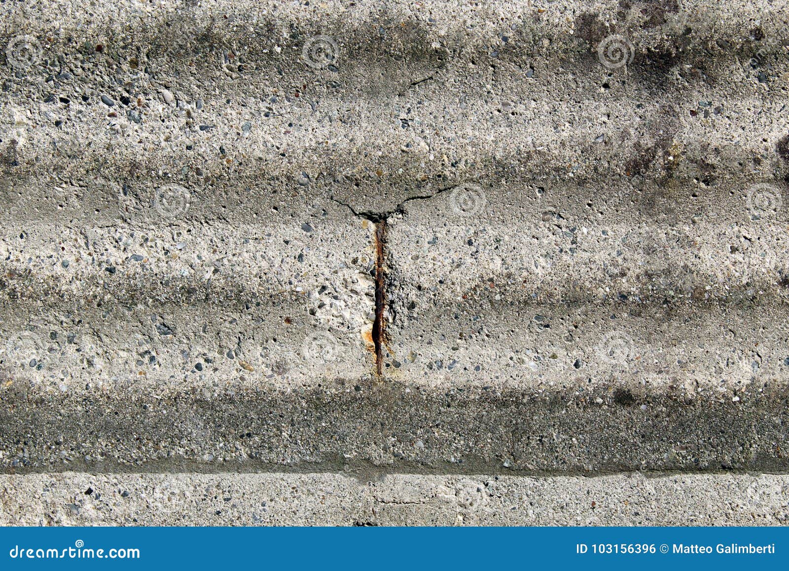 Rusty Iron Reinforcing Bar Emerging from an Old Concrete Wall Stock ...