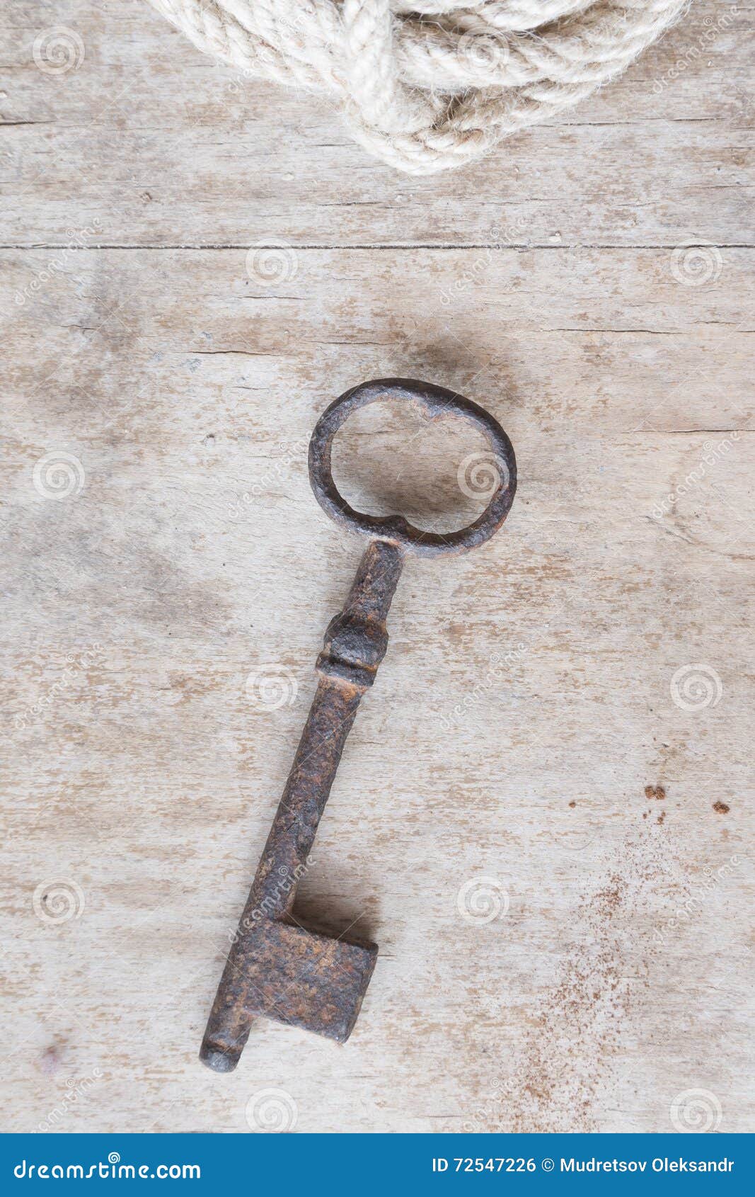 Rusty key on the table stock photo. Image of rusted, wooden - 72547226