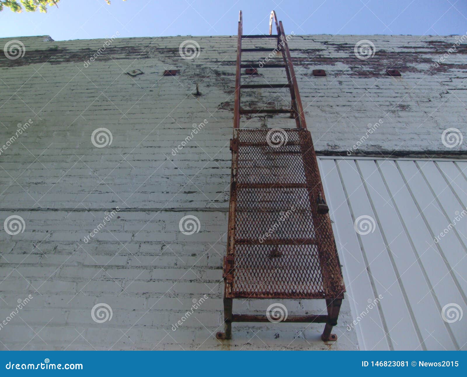 A Rusty Ladder on Side of Building 1 Stock Image - Image of light ...