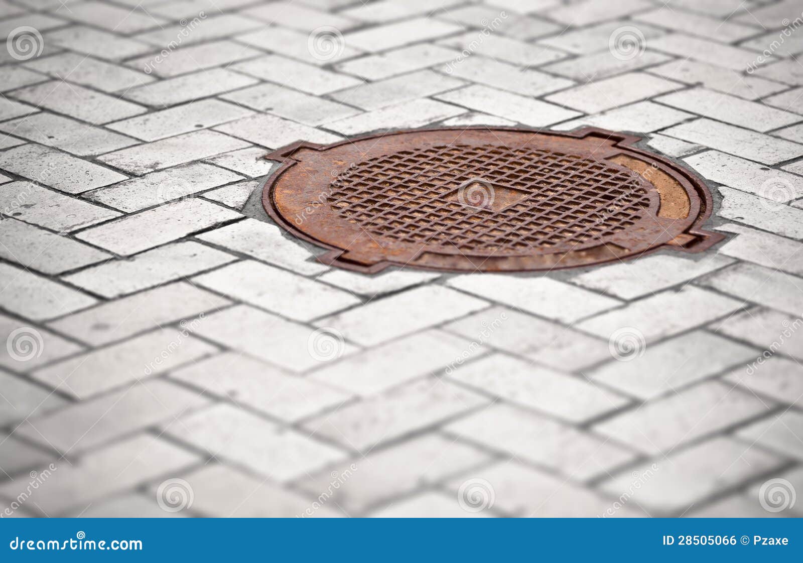 Rusty Manhole in the Pavement Stock Photo - Image of cover, rusty: 28505066